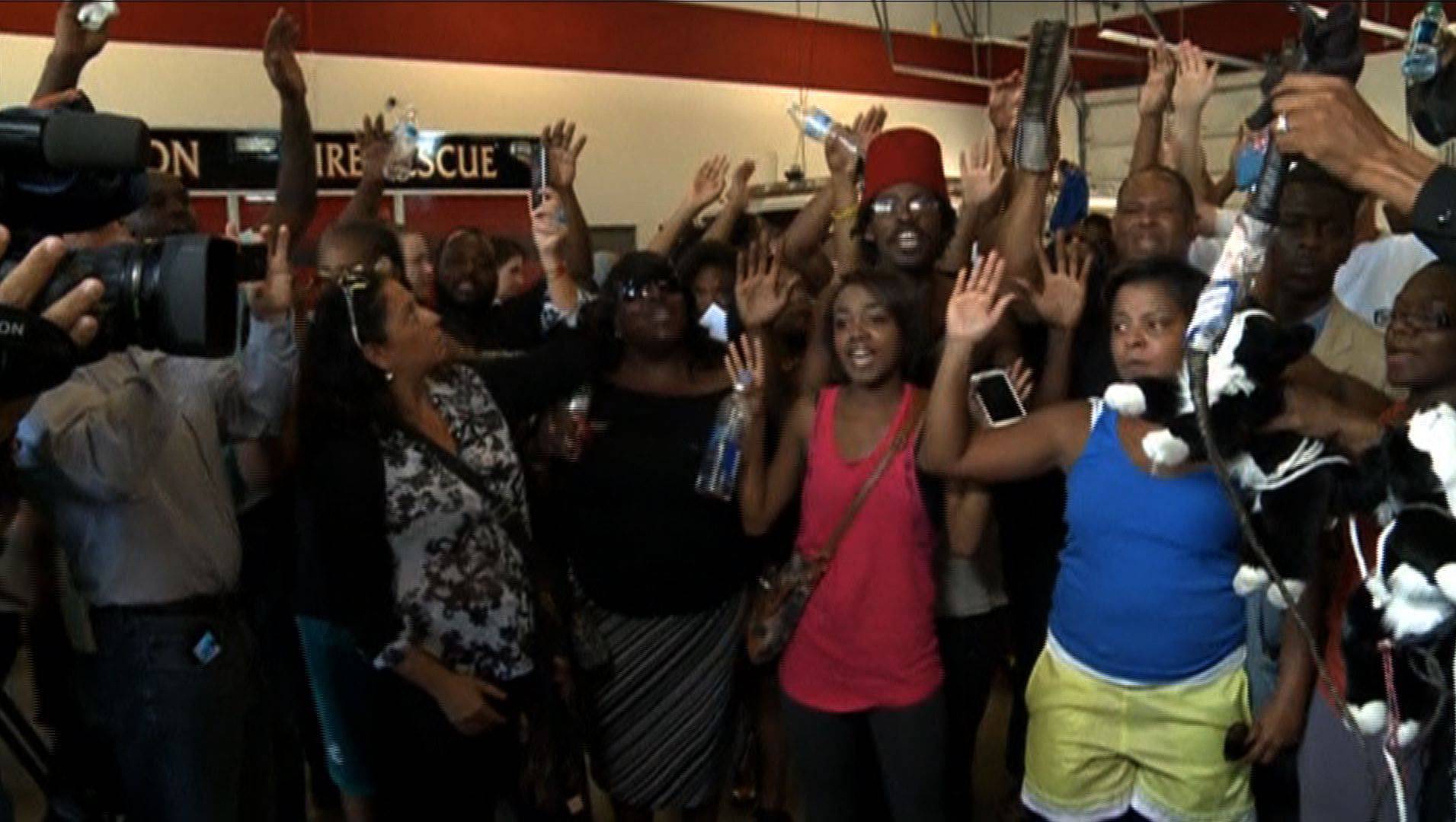 Facing National Outcry, Ferguson Police Drop Military-Grade Gear as ...